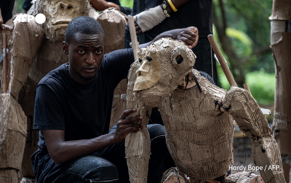 Herd of animal puppets treks from Africa to Europe in climate action