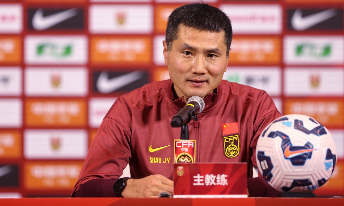 China's new head coach embarrassed after 'sensitive' phone call leaked.