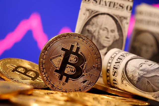 Bitcoin hits record high; trades as high as $59,755 on Saturday