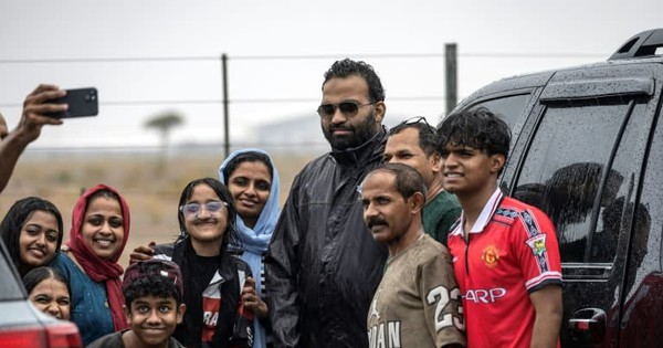 Monsoon-loving Indian expats chase rain in UAE desert