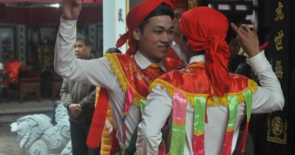 Men dressed as girls in northern traditional dance