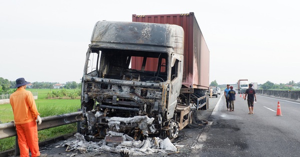 Tractor-trailer catches fire after sideswipe crash on Vietnam expressway