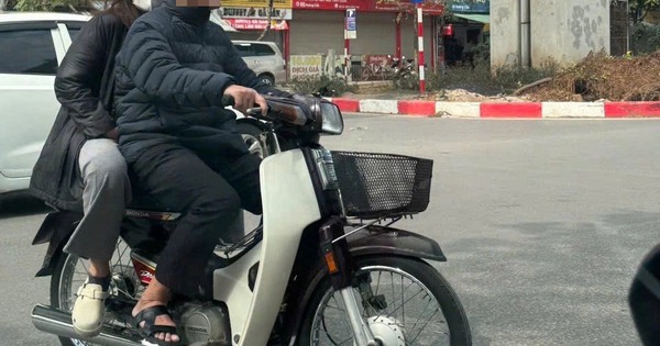 Vietnamese cop fined for riding motorcycle without helmet